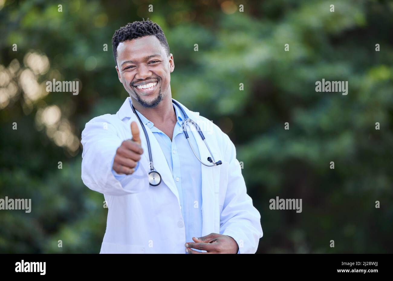 Excited young male doctor hi-res stock photography and images - Alamy