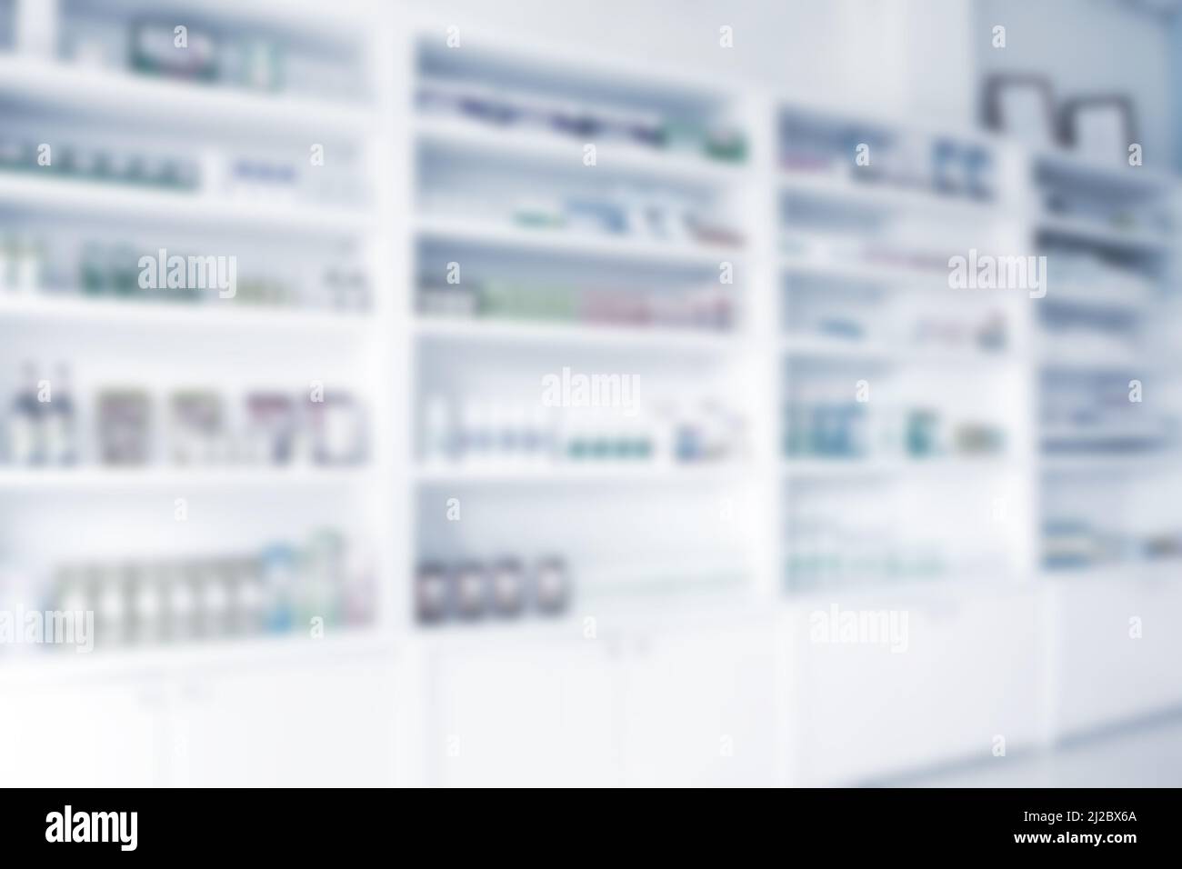 pharmacy shelves filled with medication blur background Stock Photo - Alamy