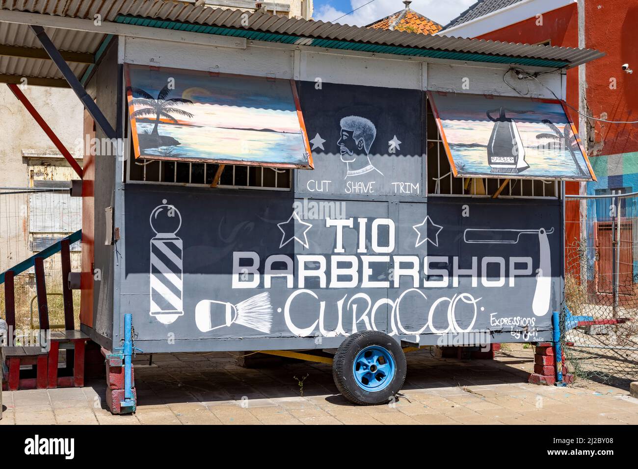 Barbershop in a booth in the streets of Willemstad, Curacao Stock Photo ...
