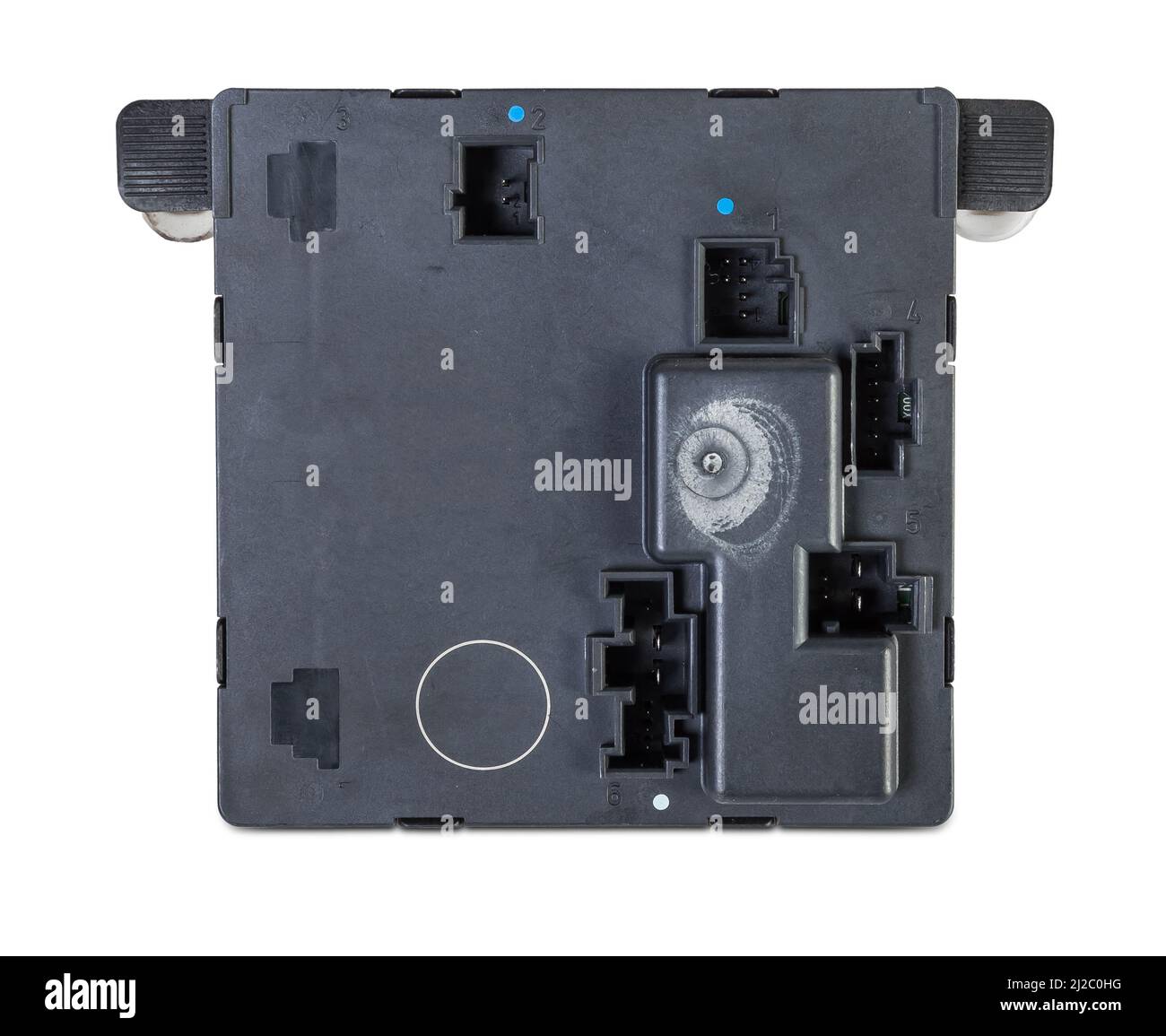 Plastic car engine control unit with metal elements on a white isolated ...