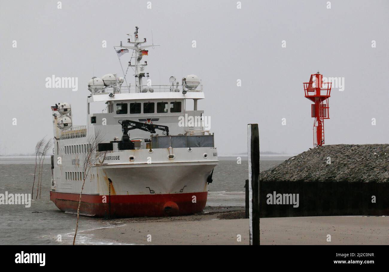 Wangerooge, Germany. 31st Mar, 2022. A ferry ran aground in the harbor ...