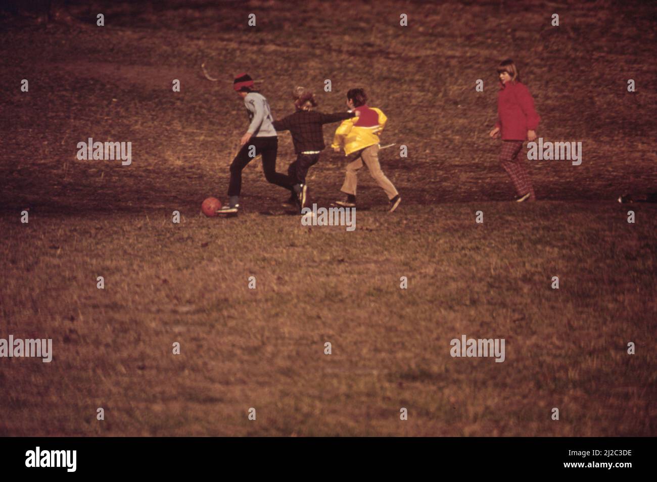 1970s children playing kickball hi-res stock photography and images - Alamy