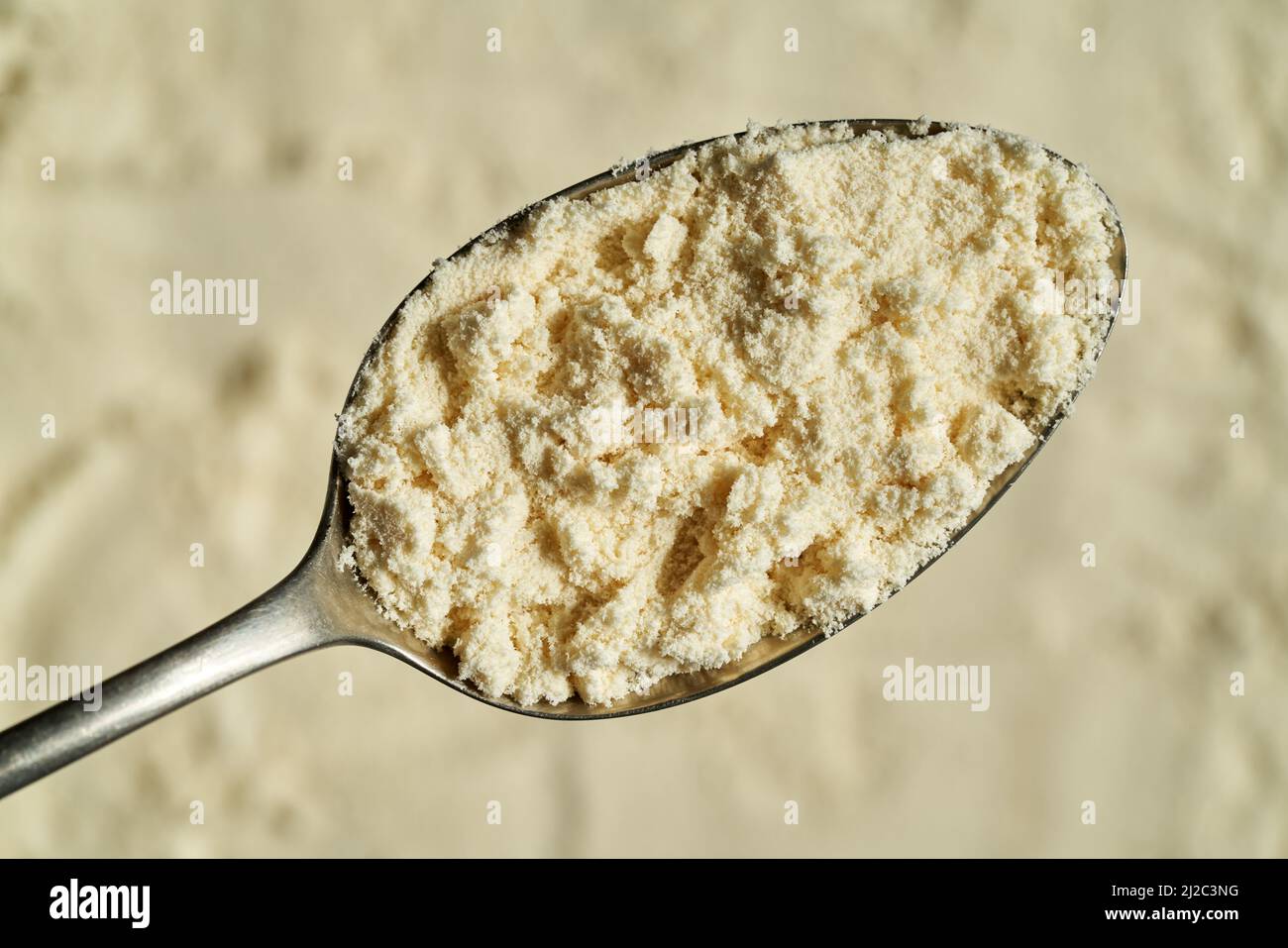 Whey protein powder on a metal spoon - healthy nutritional supplement ...