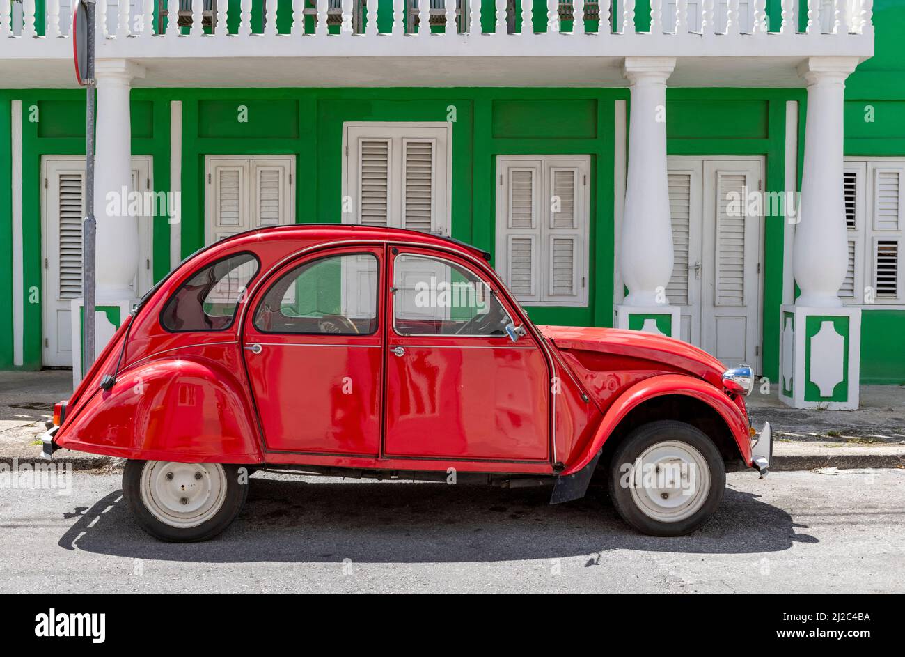 Shiny red Citroën 2CV in the streets of Willemstad, Curacao Stock Photo ...