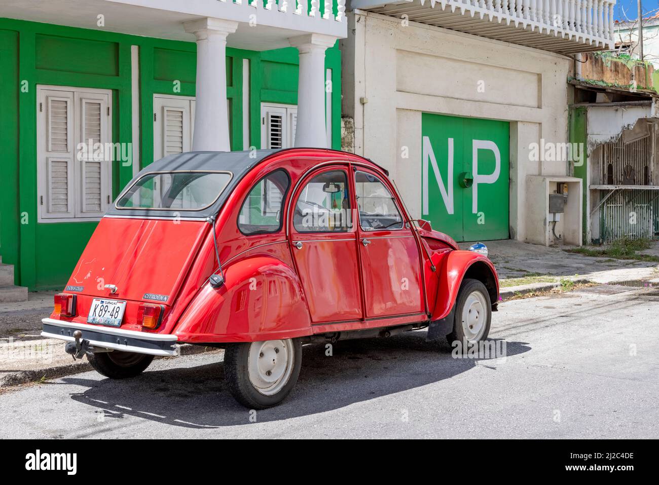Shiny red Citroën 2CV in the streets of Willemstad, Curacao Stock Photo ...