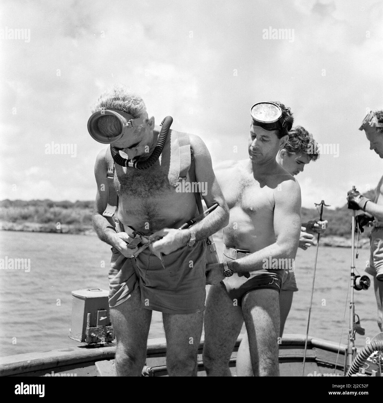 Diver Fischer and other divers on a boat in the Fuikbaai ca. October ...