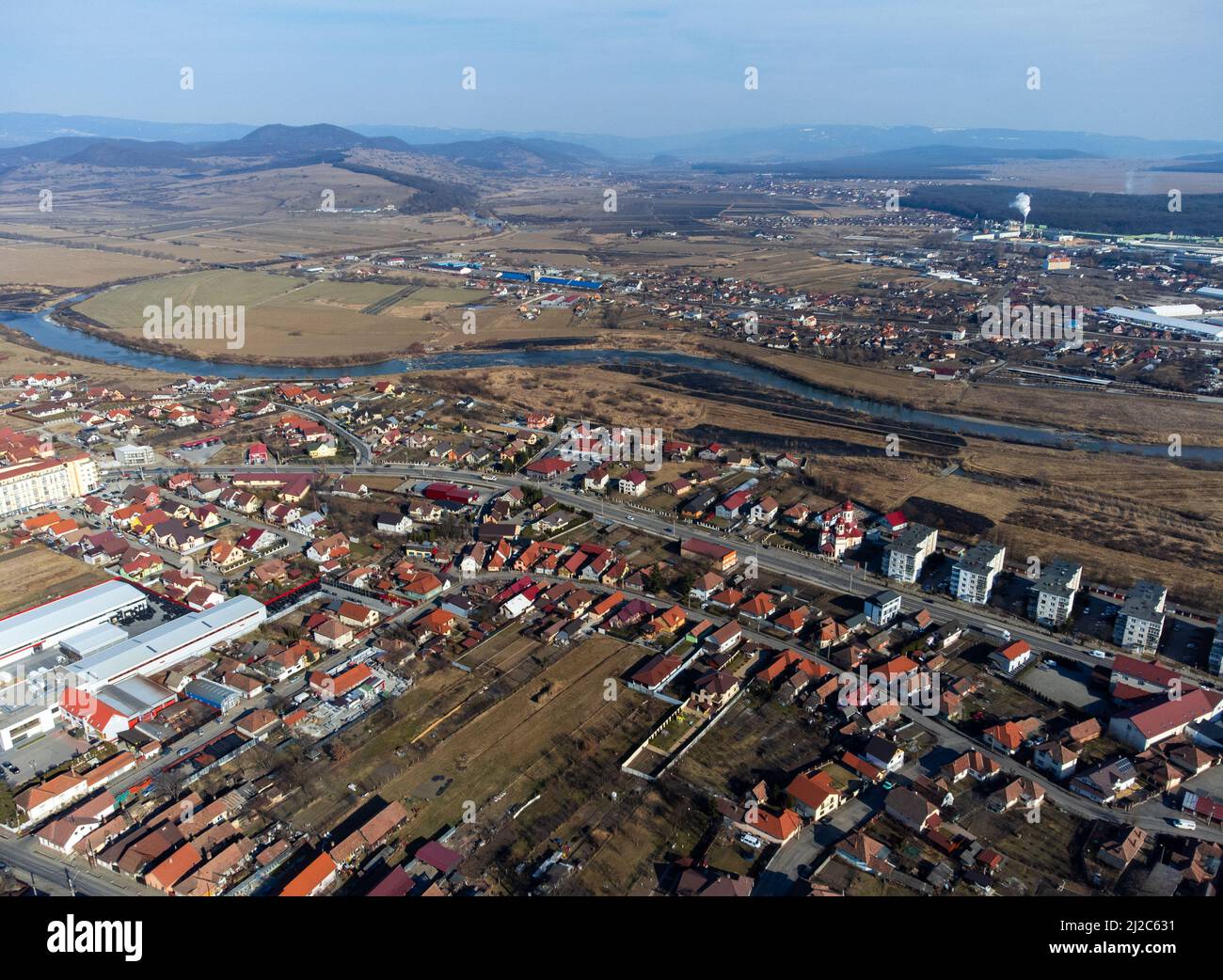 An aerial view of Reghin city with many buildings in Romania Stock ...