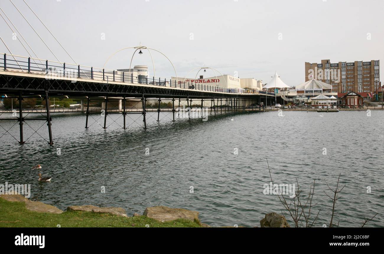 The old Victorian pier Stock Photo - Alamy
