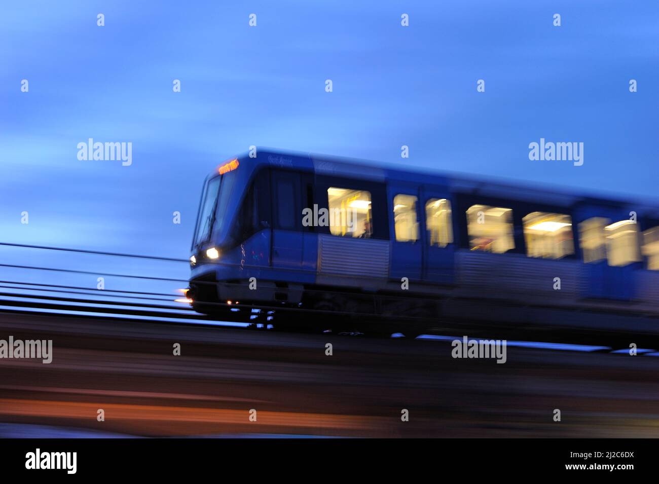Subway train at night Stock Photo - Alamy