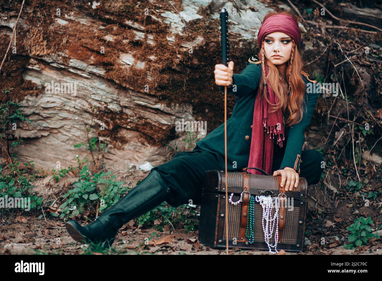 Woman holding dagger hi-res stock photography and images - Alamy