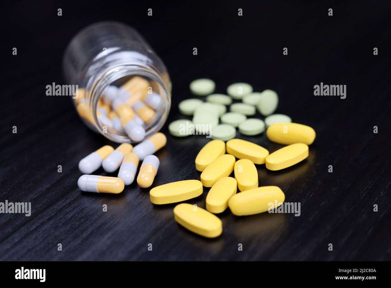 Tablets yellow dark green hi-res stock photography and images - Alamy