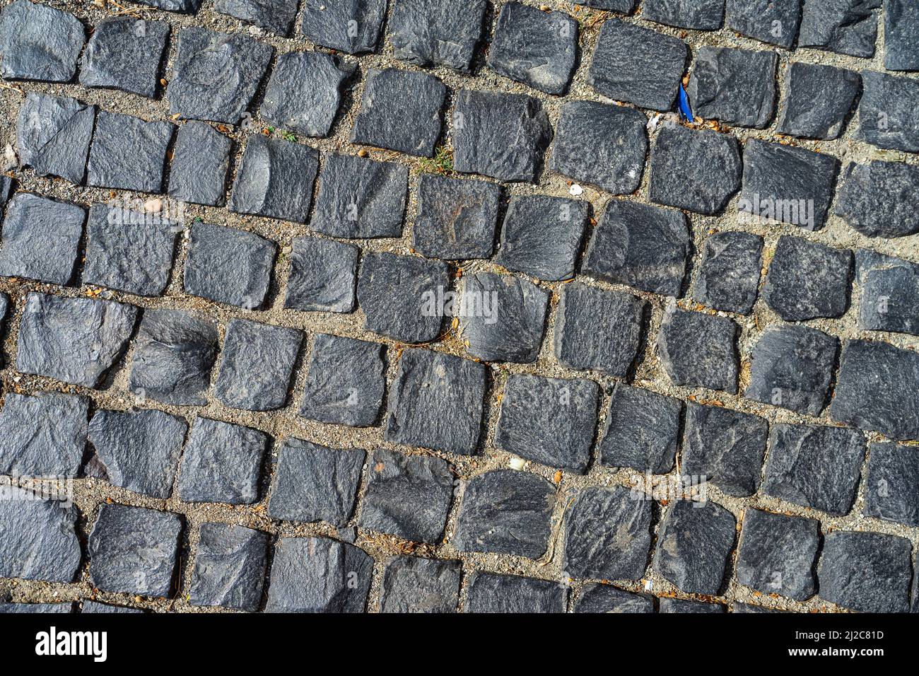 Stone pavement texture. Granite cobblestoned pavement background Stock ...