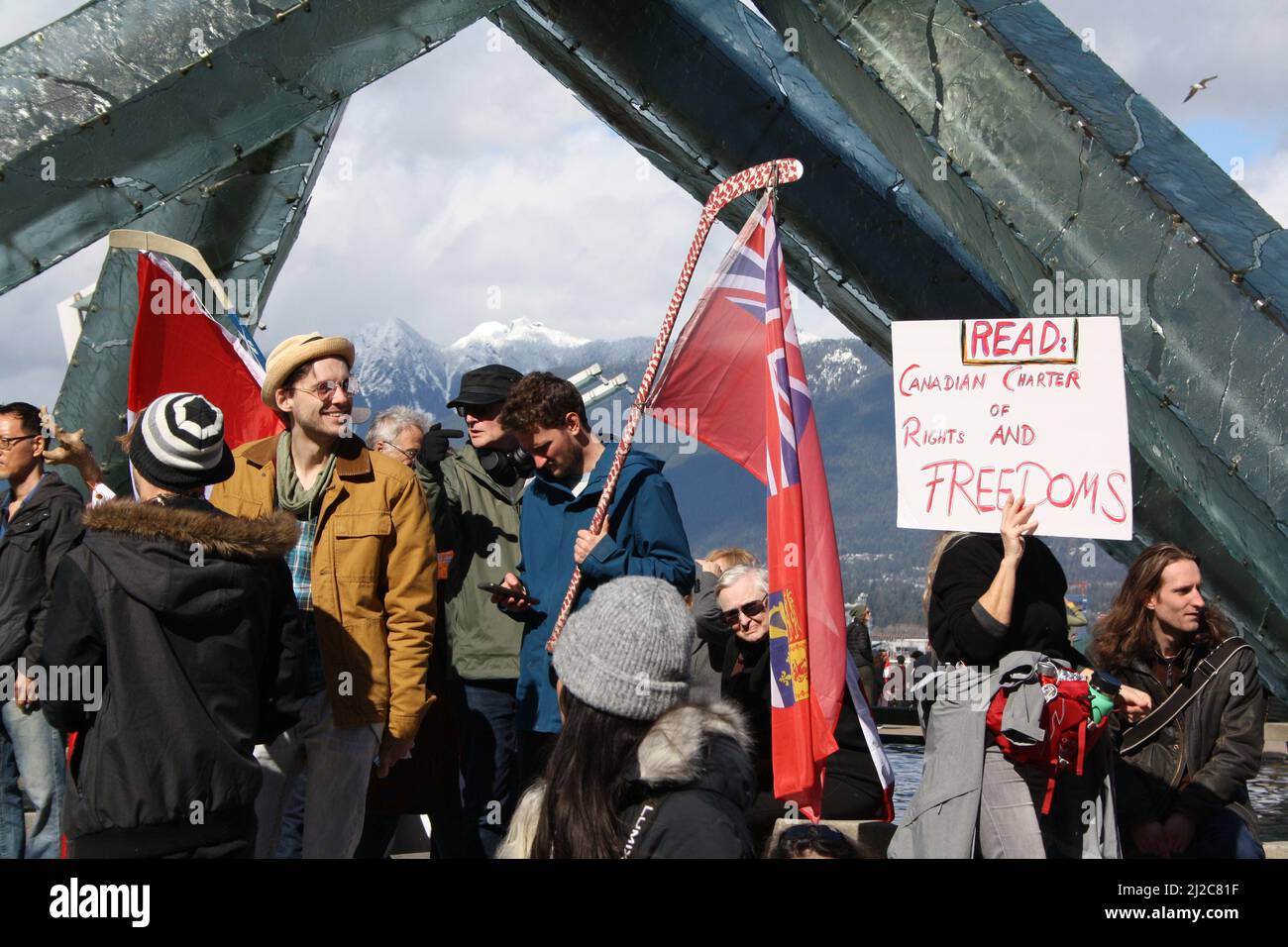 A group of Protestors with flags and slogans in downtown Vancouver ...