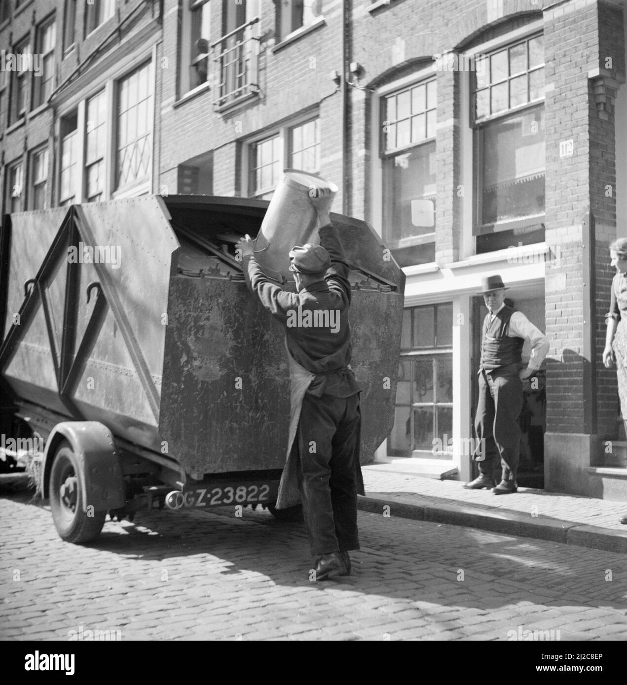 Garbage man Black and White Stock Photos & Images - Alamy
