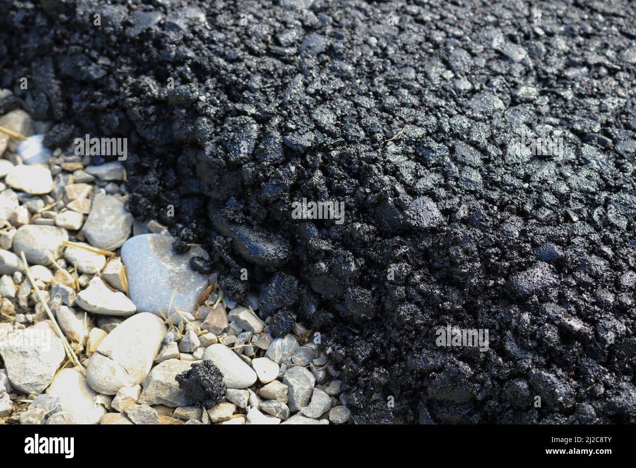 New layer of asphalt road under construction Stock Photo - Alamy