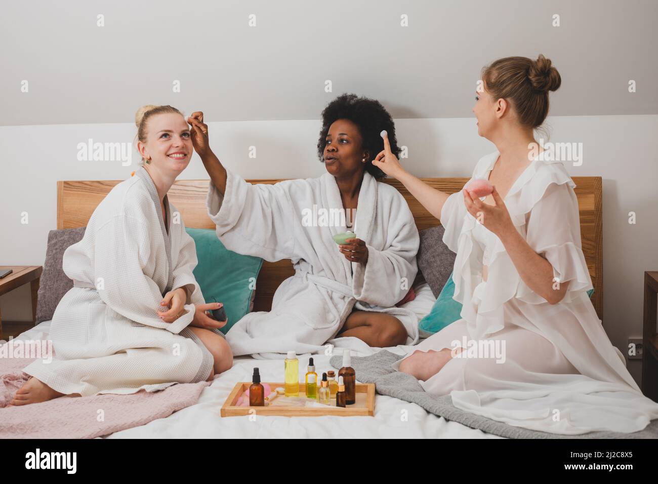 The young women are having a spa party Stock Photo - Alamy