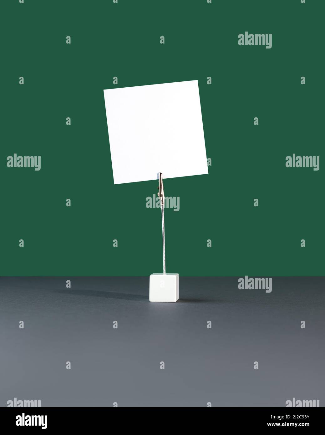 Memo note stand holder with clip with blank card on green and gray ...