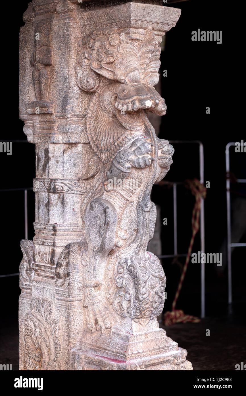 A vertical shot of a beautiful ancient Yali statue in the Thanjavur ...