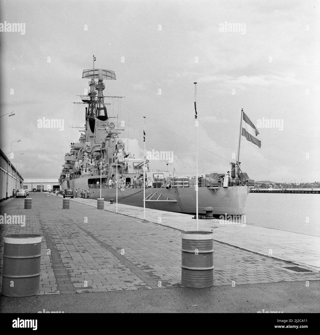 H.M. cruiser De Ruyter on the quay around October 1955 Stock Photo - Alamy