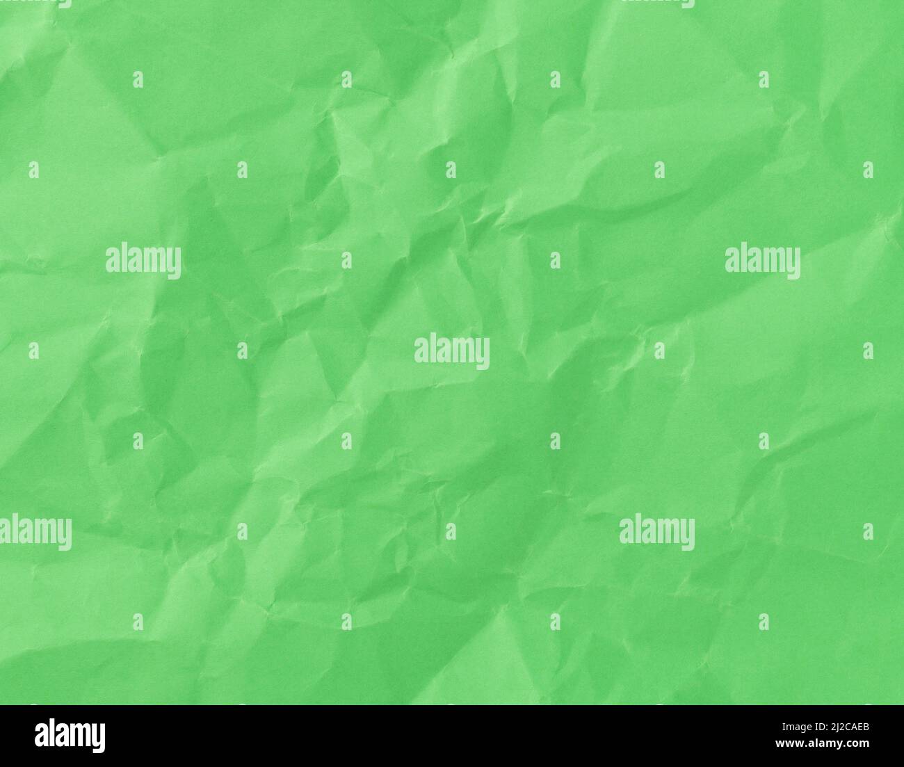 Wrinkled sheet of green paper. Textured backdrop Stock Photo - Alamy