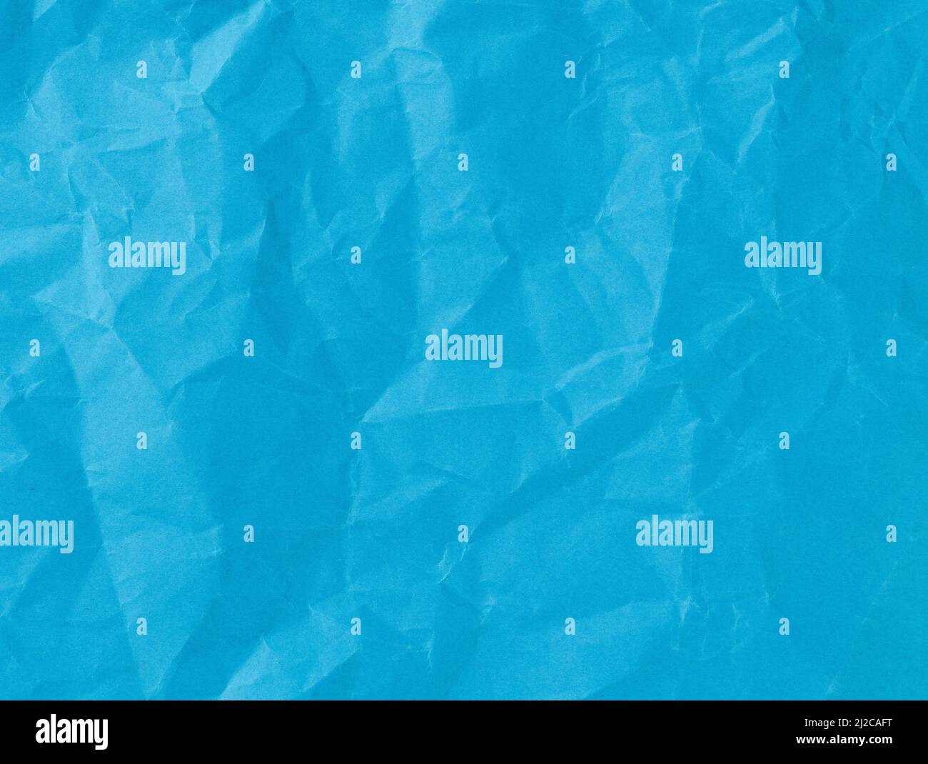 Wrinkled sheet of blue paper. Textured backdrop Stock Photo - Alamy