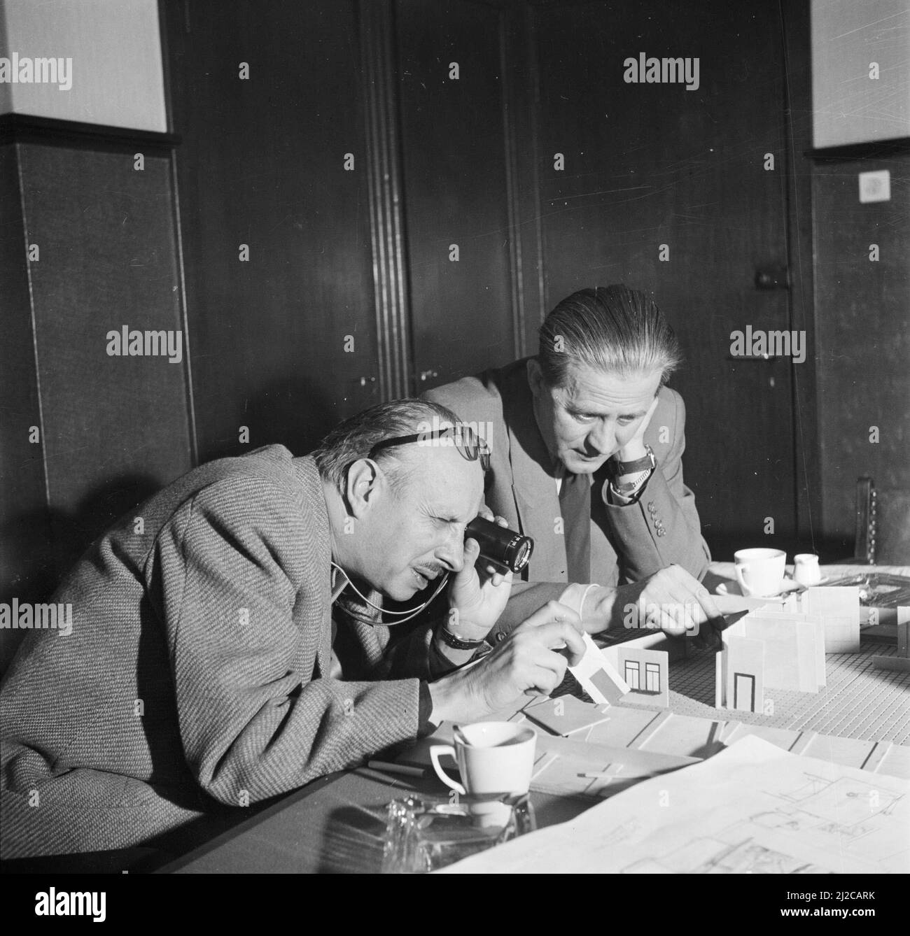 Film director Gerard Rutten and producer Bobby Roosenboom check a model ...