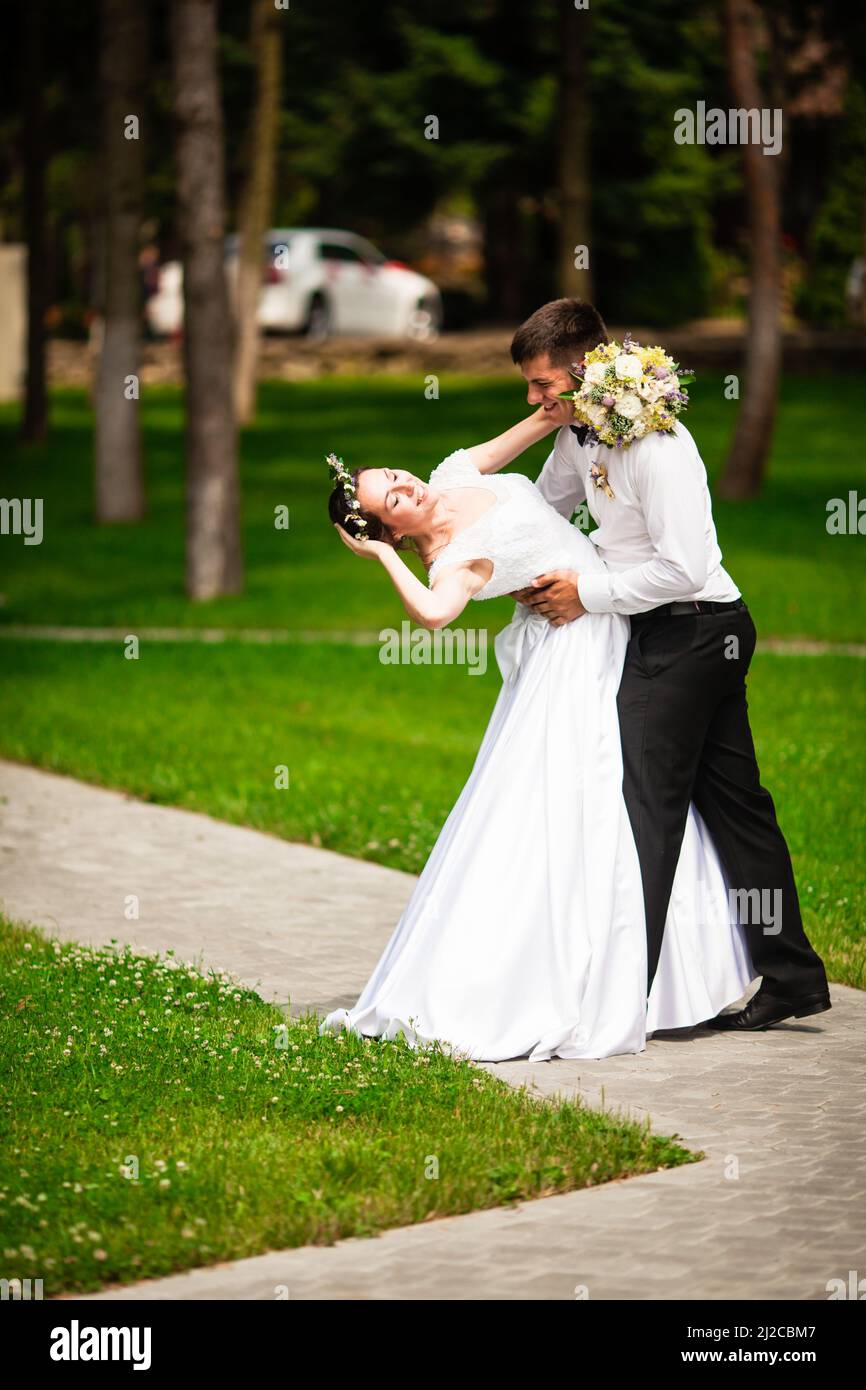 Happy bride and groom after wedding ceremony Stock Photo - Alamy
