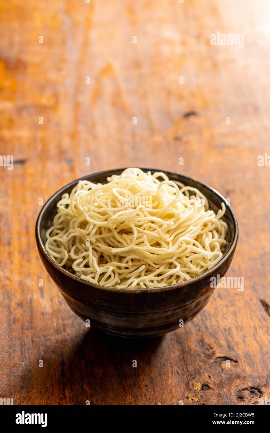 Instant noodles. Cooked chinese noodles in a bowl Stock Photo - Alamy