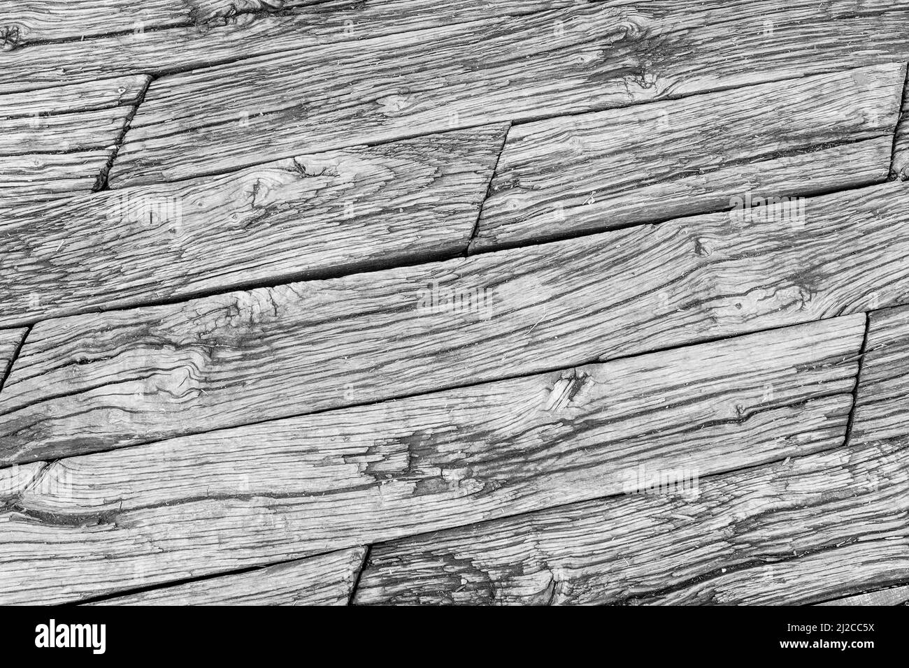 Old wooden planks connected diagonally for background design. A backing ...