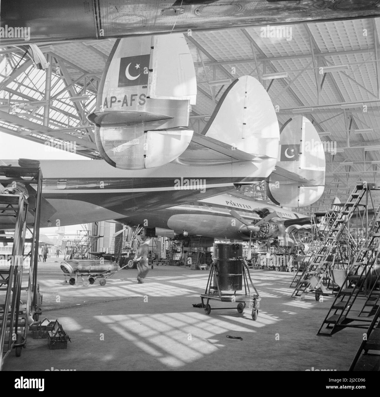 Airplane inside an airplane hangar at an airport in the 1950s Stock ...
