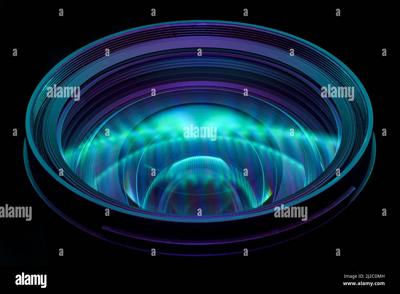 A camera lens with the reflection of lights on a black background Stock ...