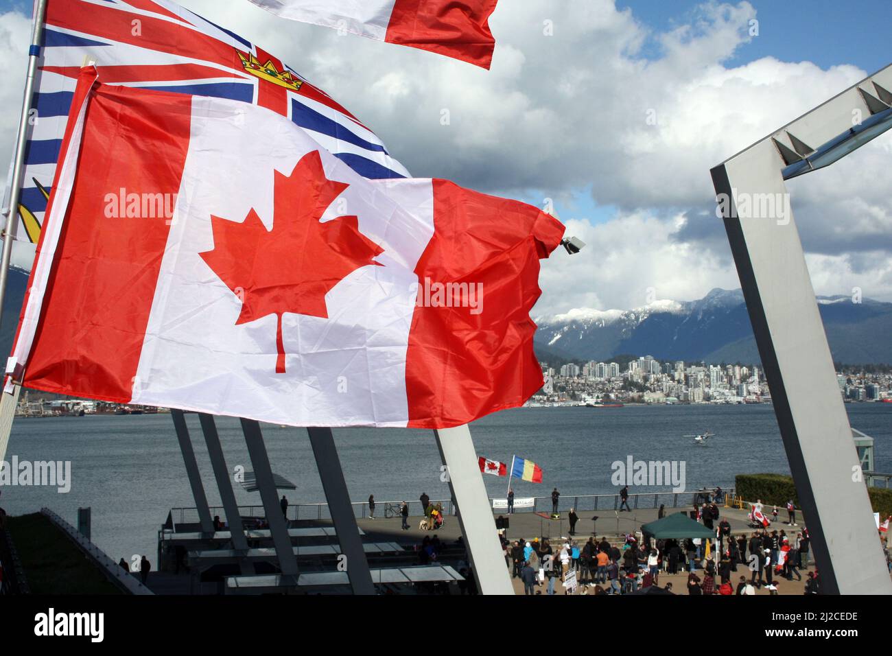 The Canadian flag winding in downtown Vancouver, British Columbia ...