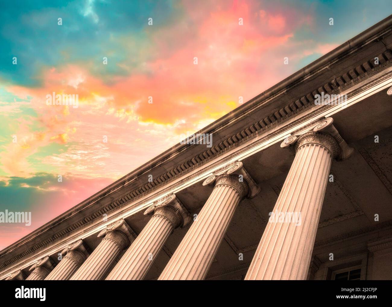 Classical columns on government building with colorful sky Stock Photo ...