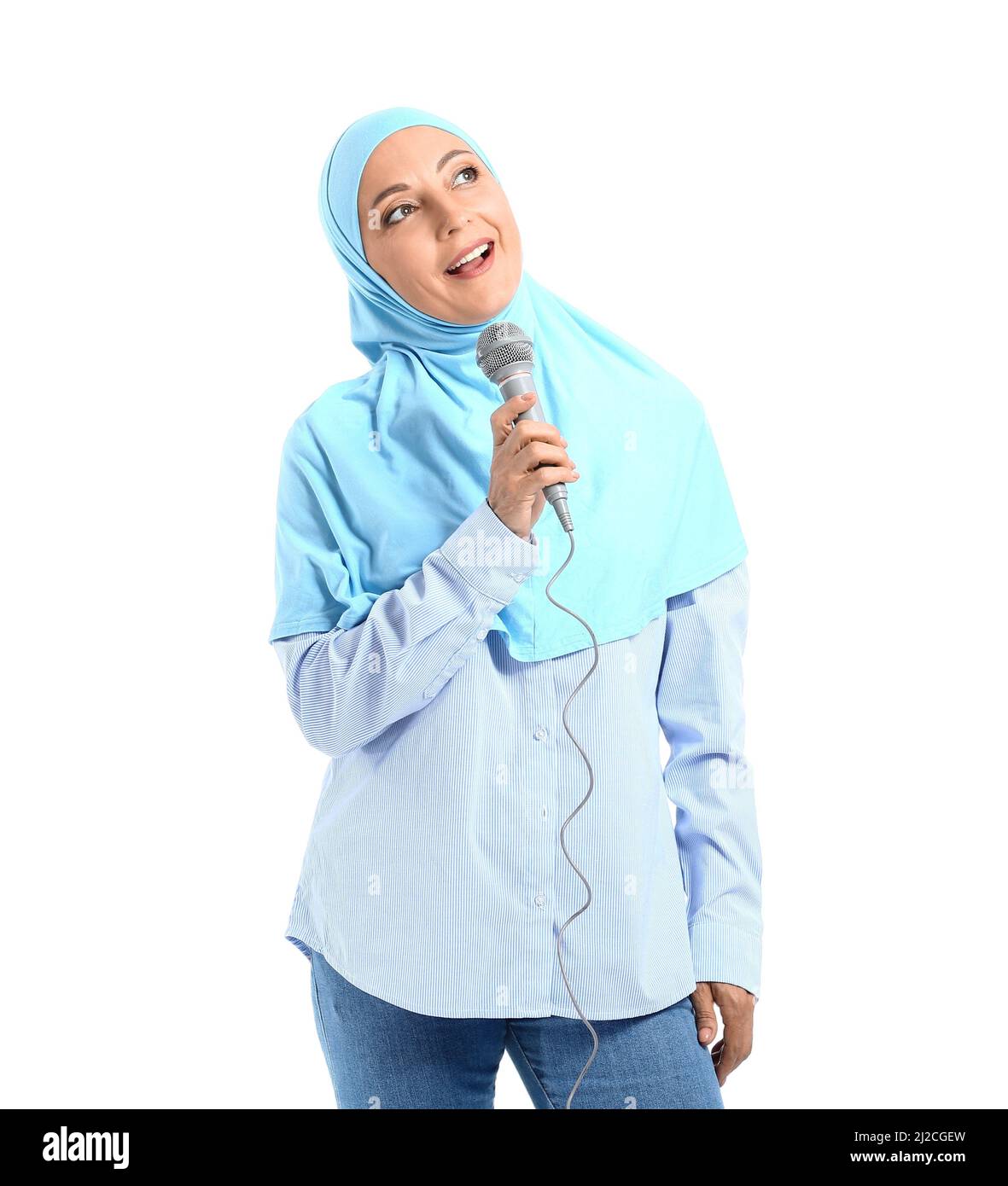 Muslim music teacher with microphone on white background Stock Photo ...