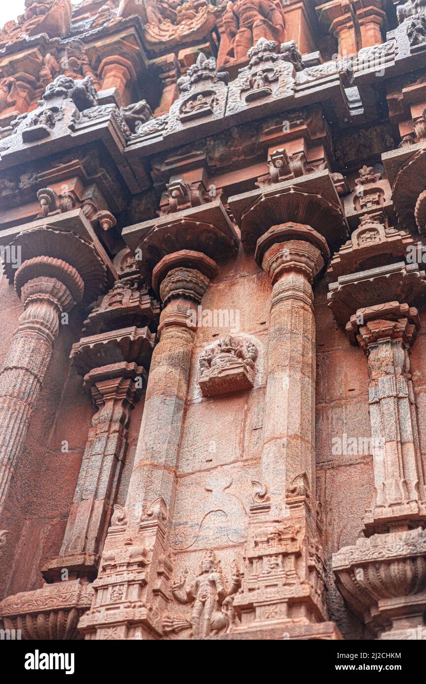 A vertical low angle shot of the sculptures and columns on the ...