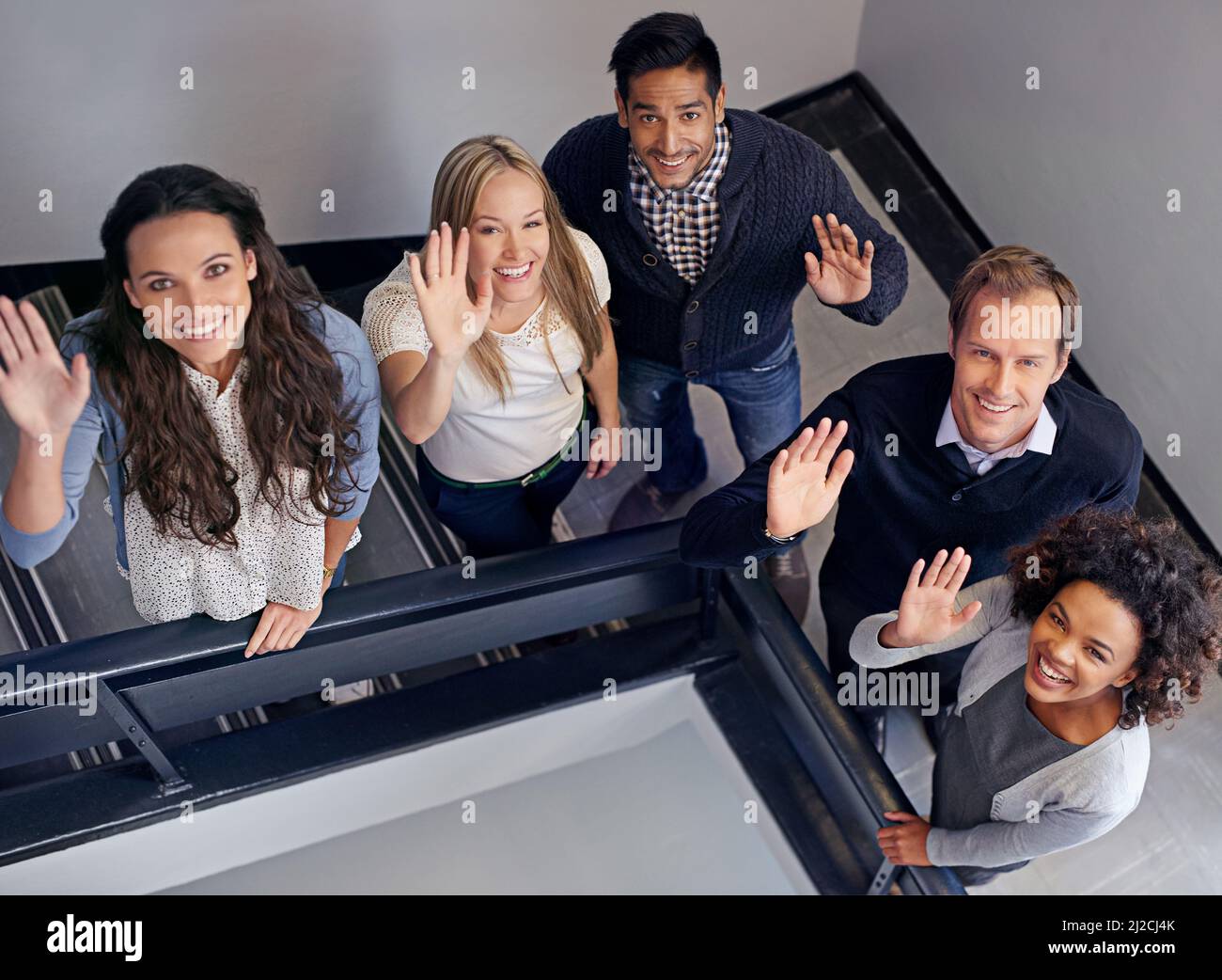 Group happy business people waving hi-res stock photography and images ...