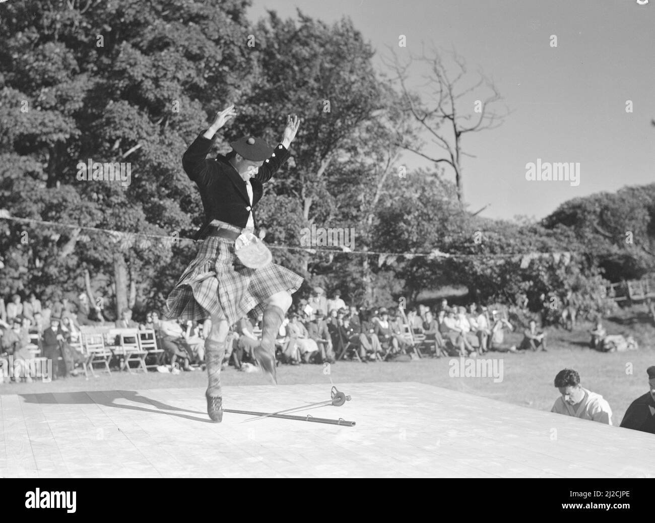 Dancing to the music of the bagpipes at the Highland Games on Skye, a ...