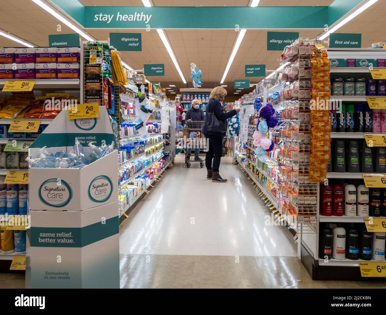 Kirkland, WA USA - circa October 2021: Woman browsing medicine and ...