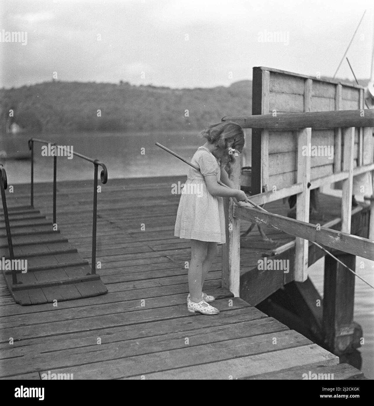 Vintage 1950's fishing Black and White Stock Photos & Images - Alamy