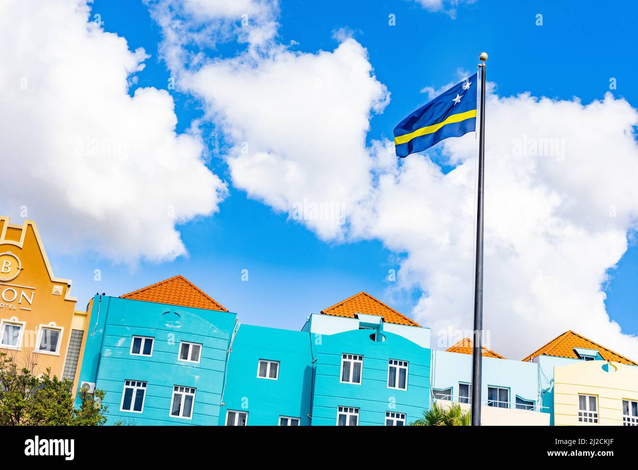 Flag of Curacao waving at the city center of Willemstad, Curacao Stock ...