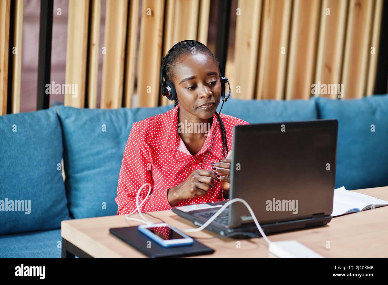 African american woman works in a call center operator and customer ...
