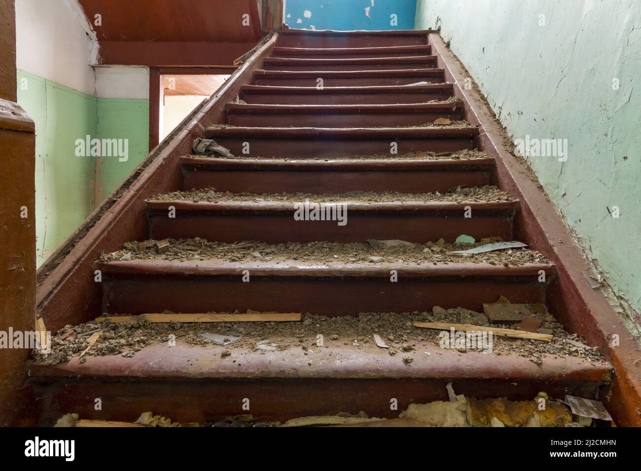 Wooden staircase without railings of the house abandoned by the ...