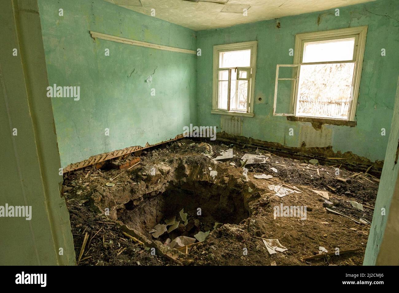 Funnel from the explosion in one of rooms of the house abandoned by the ...