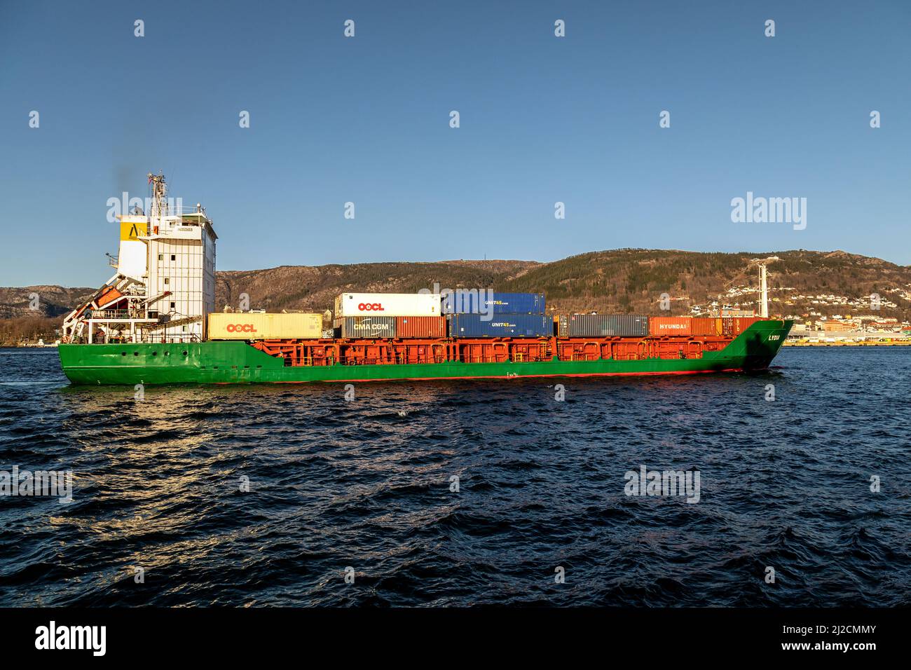 General cargo and container feeder vessel Lydia at Byfjorden, arriving ...