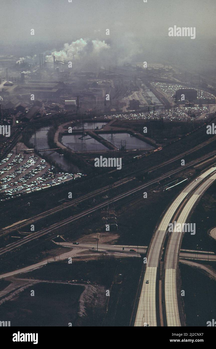 Indiana toll road, with light traffic. U.S. Steel, engulfed in its own ...