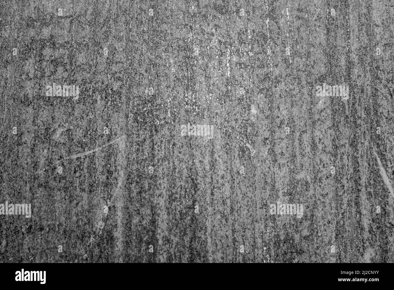 Gray metal surface, background, texture. The surface is destroyed by ...