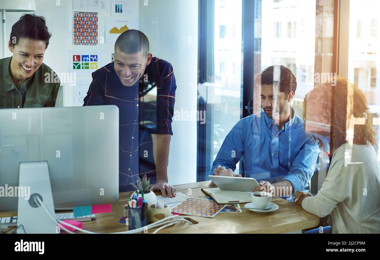 May the best collaboration win. Shot of businesspeople working in teams ...