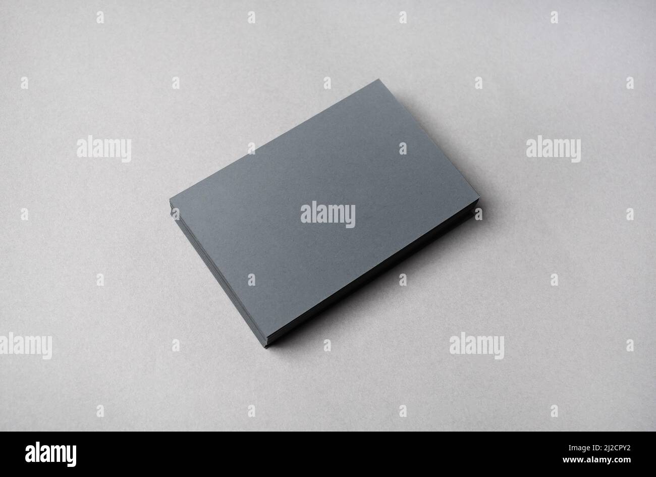 Photo of blank gray business cards on gray paper background. Template ...