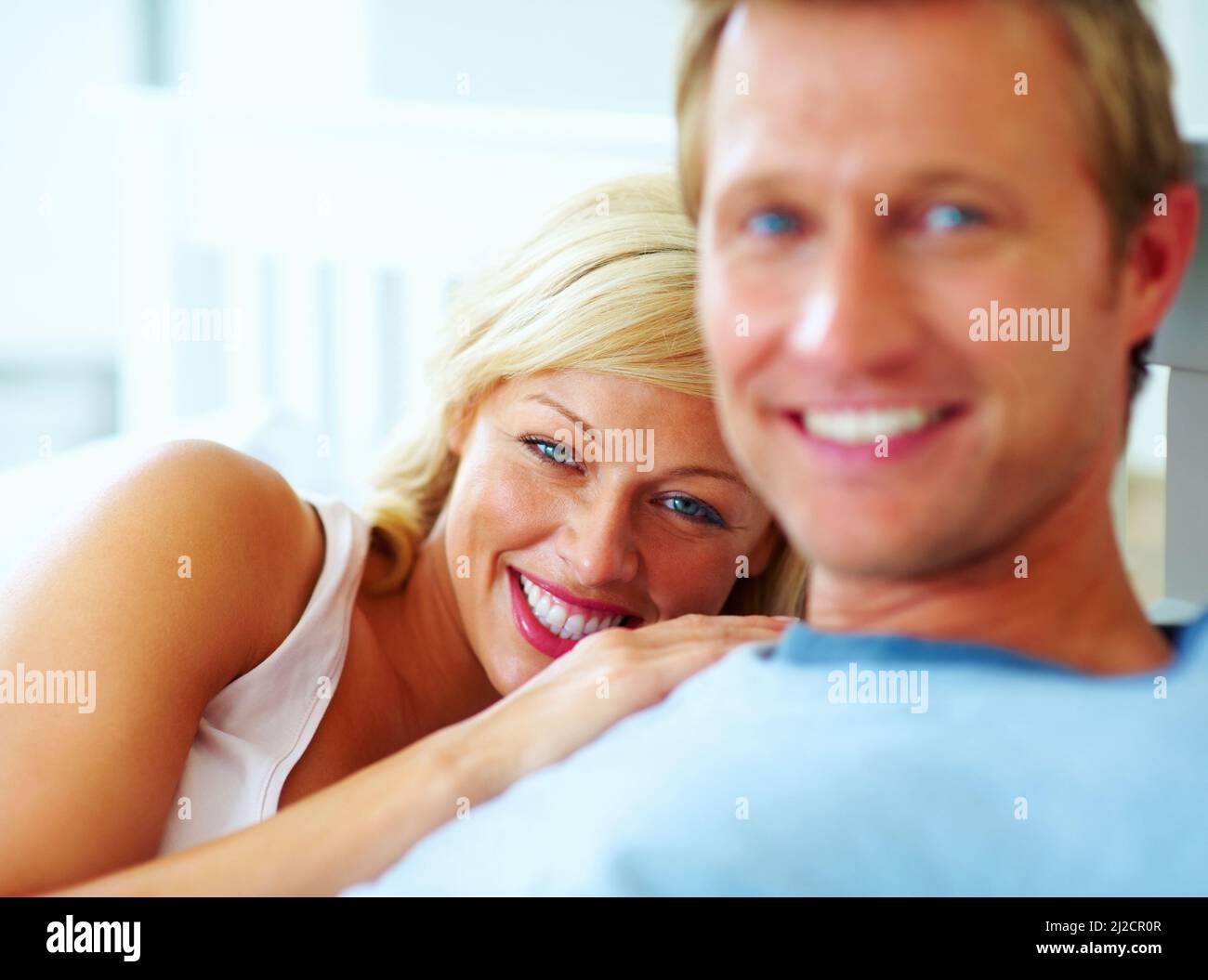 Happy middle aged woman resting on mans chest. Portrait of a happy ...