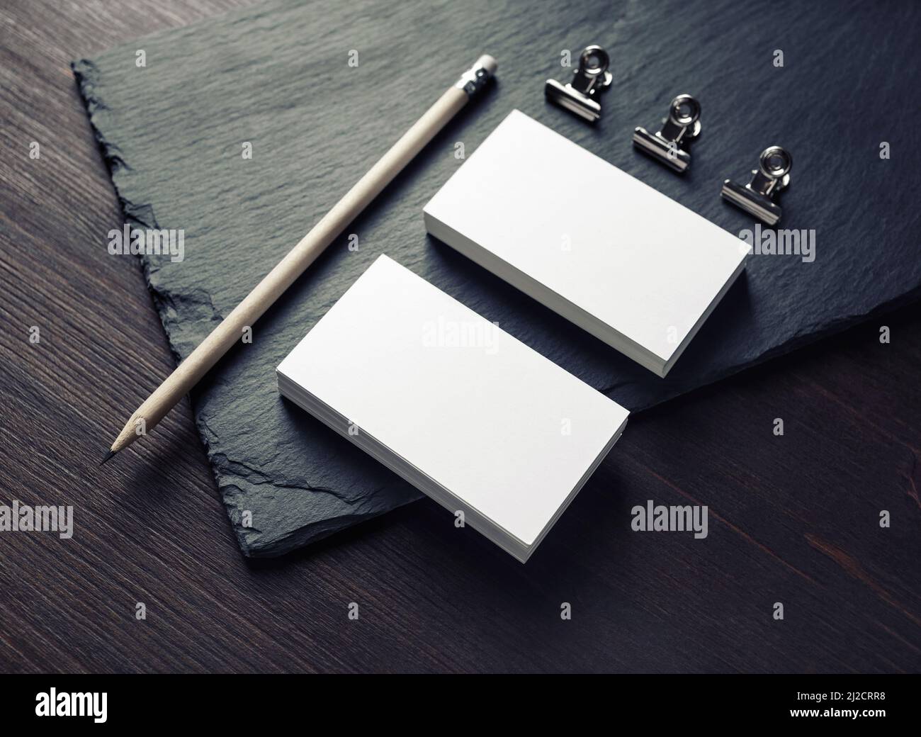 Photo of blank business cards, pencil and clips. Responsive design ...